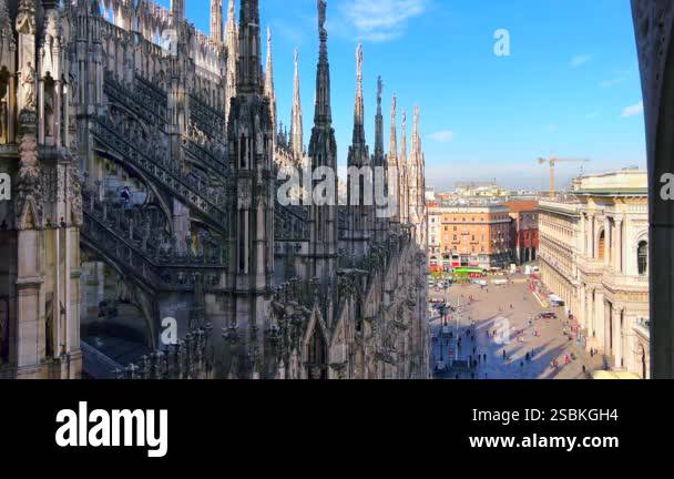 The richly decorated rooftop of Milan Cathedral with many carved stone ...