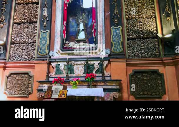 The sculptured altar with Virgin Mary and ornate frescoed dome ...