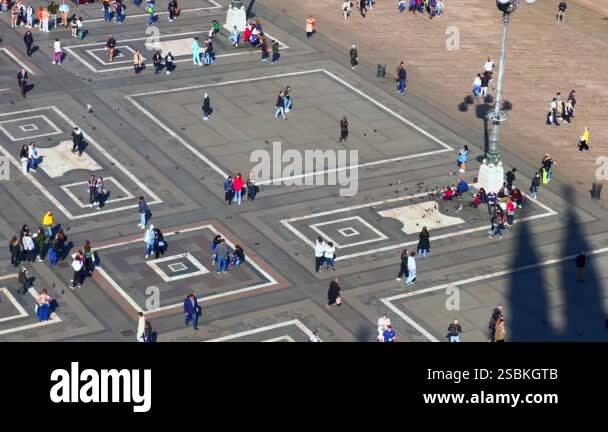 The crowded pedestrian Cathedral Square (Piazza del Duomo) with ...