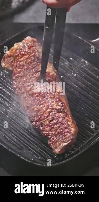delicious juicy wagyu beef steak meat cooking on a grill pan. Process ...