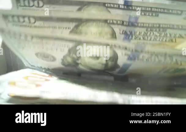 Finance and cash dollars concept. Counting dollars with electronic ...