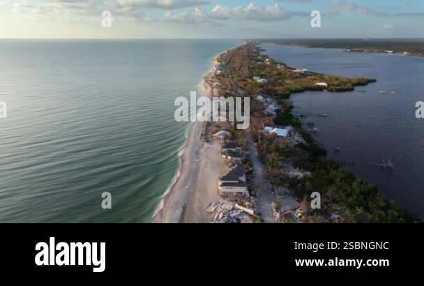 Storm surge severe damage to residential houses on ocean shore after ...