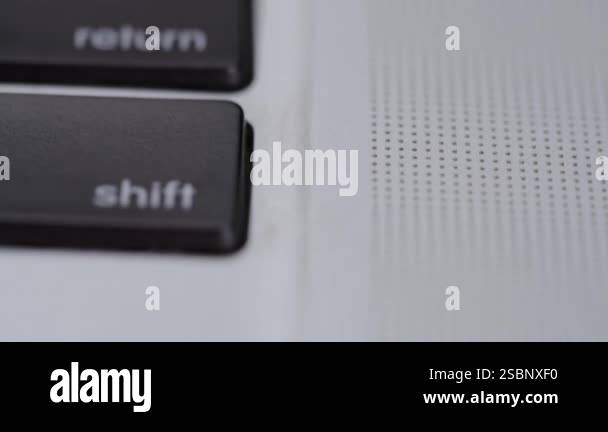 Slow motion of close-up mans finger pressing turn on button on the ...
