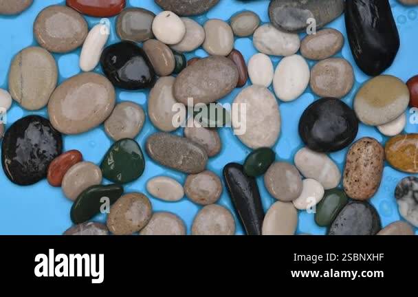 Blue pebbles Stock Videos & Footage - HD and 4K Video Clips - Alamy