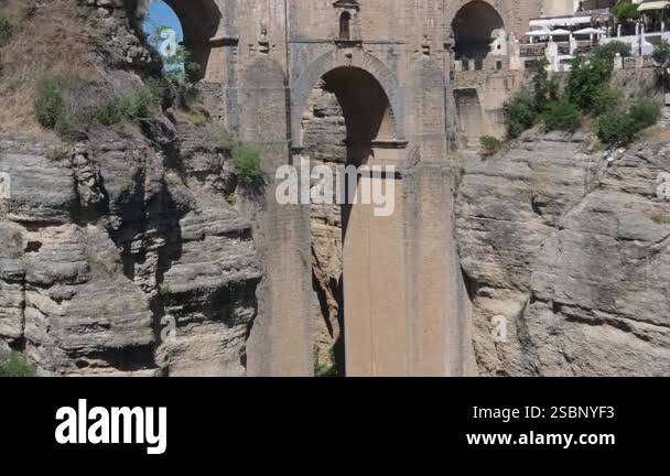 Ronda, Malaga - Spain - 07-04-2024: A view of the Puente Nuevo bridge ...