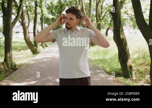 Athletic fitness sport runner man training marathon run, listening ...