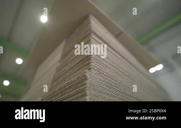 Products in form of cardboard materials in plant storage. Stack allows ...