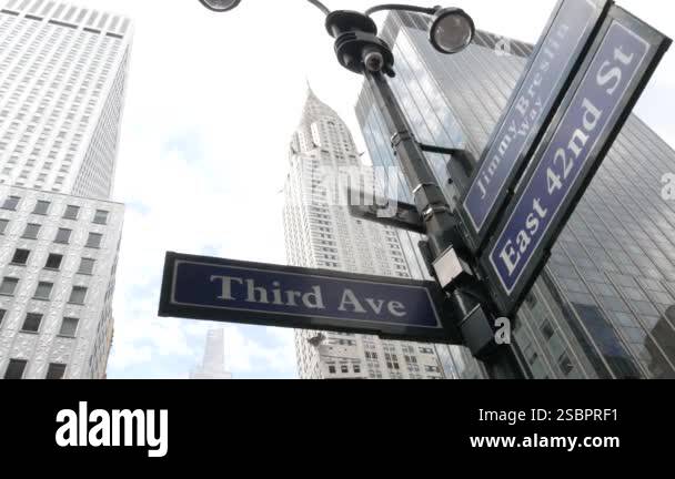 New York City crossroad, street intersection road sign. Chrysler ...