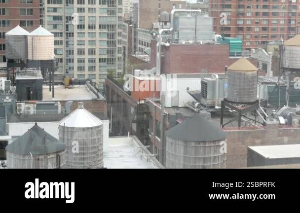 New York City Manhattan cityscape. Rooftop water towers from view point ...