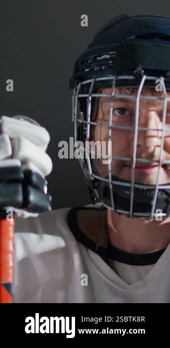 Portrait of a forward hockey player looking at the camera, sports ...