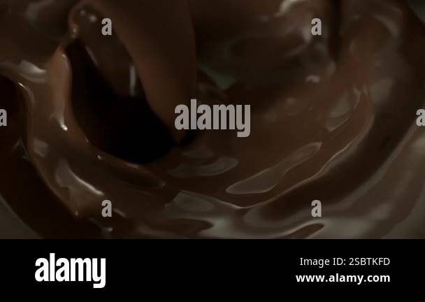Super Slow Motion Detail Shot of Pouring Melted Chocolate at 1000fps. Filmed with High Speed ...