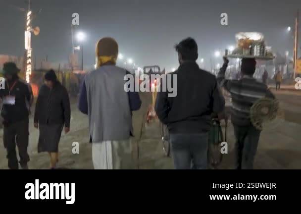 Prayagraj, Uttar Pradesh, India, 11 January 2025. A lively crowd moves ...