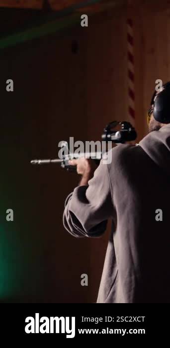 Vertical video Shooting range customer shooting targets with ...