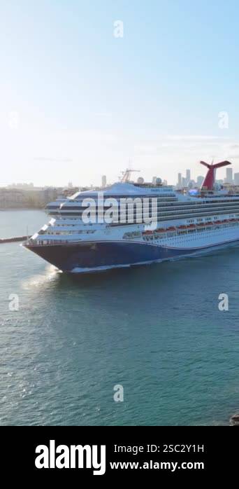Witness the stunning aerial view of a magnificent cruise ship sailing ...