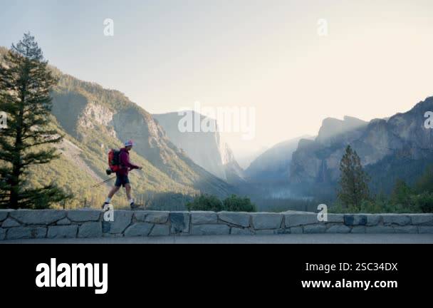 Enthusiastic hiker explores the breathtaking landscapes of Yosemite ...