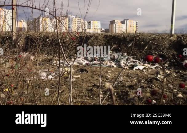 View near the city, near apartment buildings and piles of garbage ...