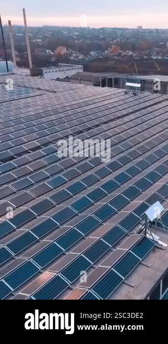 Solar electric power from above. Aerial view of solar energy on rooftop ...