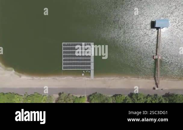 Drone footage aerial view solar cell panel floating on the river ...