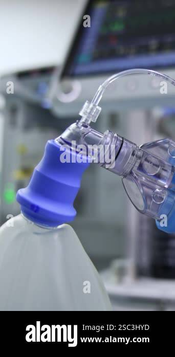 Thick tubes connected to inflating ambu bag. Close up. Lung ventilator ...