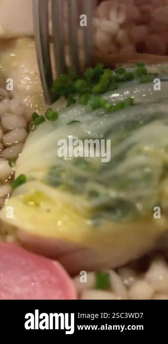 fish in a cabbage leaf white juice of the fish to get with a fork on ...