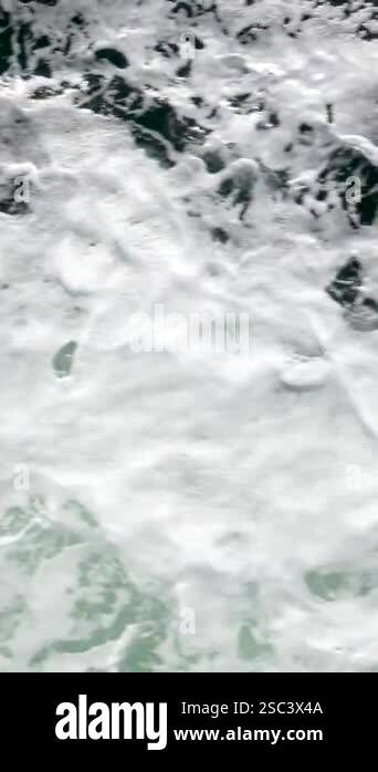 Sea waves with foam near the shore. Sea surface aerial view 4K ...