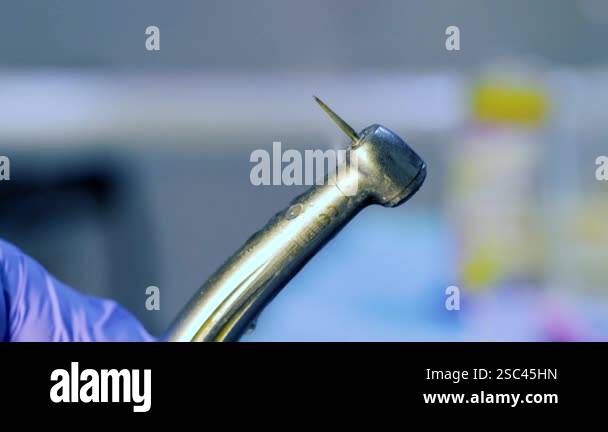 High-speed dental bur, which is fitted with a diamond bur for ...
