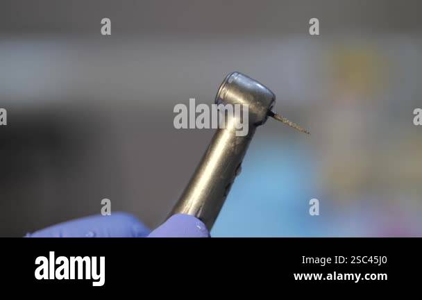 High-speed dental bur, which is fitted with a diamond bur for ...