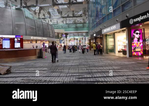 People walking through a modern indoor area Stock Video Footage - Alamy