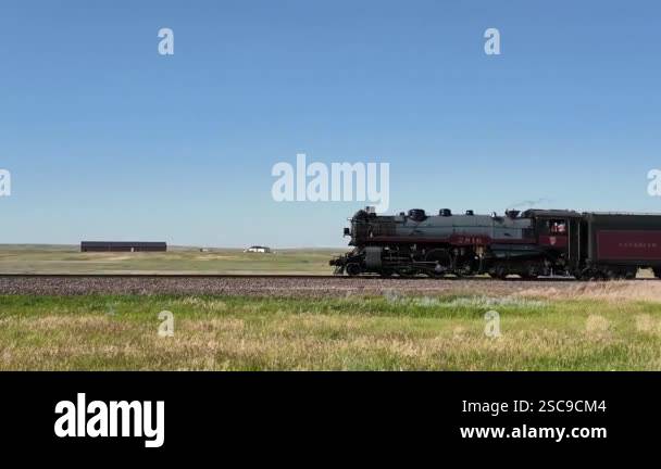Steam train 2816 travelling across the Canadian prairies Stock Video ...