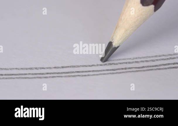 Artist hand drawing a flat gray line with a graphite wooden pencil on ...