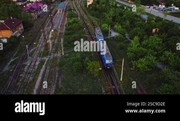 Train Navigating Railroad Approaching Weathered Depot Industrial Area Sunrise Dawn Vibrant ...