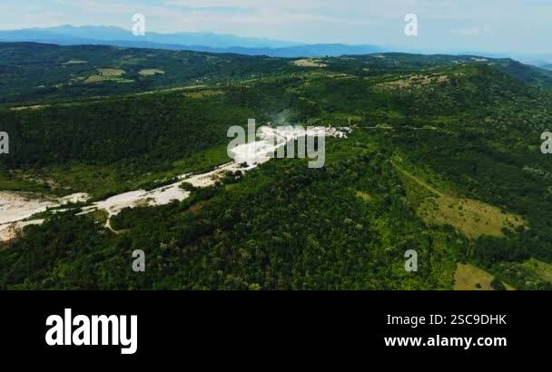 Heavy Machinery On Mountain Top Quarry Excavation Dust Summer Heat ...