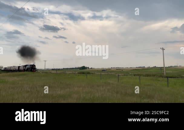 Steam train 2816 travelling across the Canadian prairies Stock Video ...
