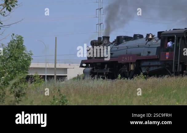 Steam train 2816 travelling across the Canadian prairies Stock Video ...
