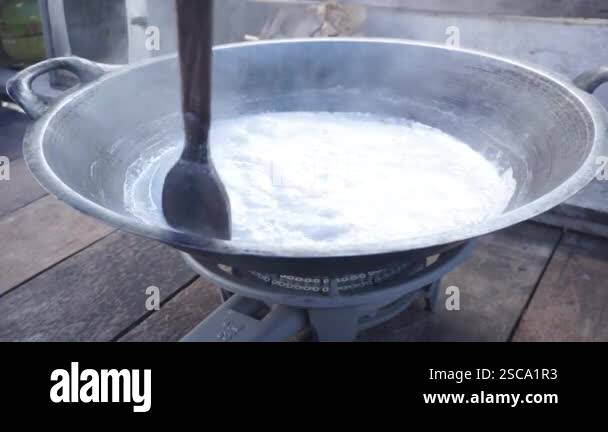 Stirring Cooking Batter in a Hot Pan, Traditional Cooking Process Stock ...