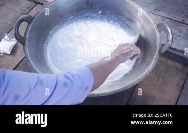 Stirring Cooking Batter in a Hot Pan, Traditional Cooking Process Stock ...