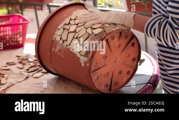 Step by step process showing how to craft a stunning mosaic flower pot ...
