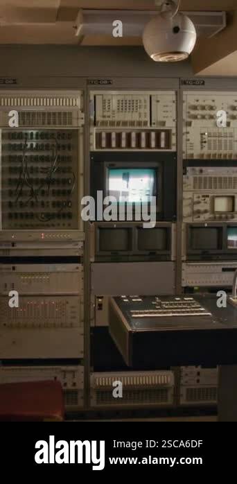 Medium full vertical shot of interior of mobile TV production studio ...