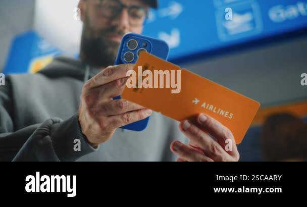 International Airport Terminal: Close Up of Male Passenger Scanning ...