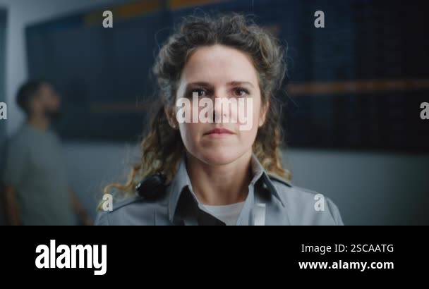 Portrait of Female Security Officer Looking at Camera. TSA Worker in ...
