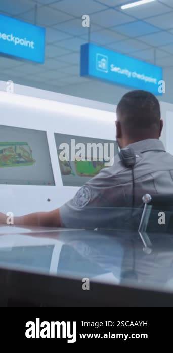 Airport: African American Security Officer Monitors Baggage Screening ...