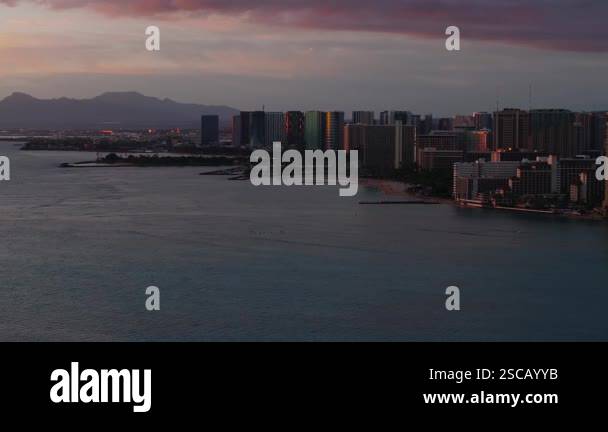 Aerial view of Honolulu, Hawaii, during sunset with Waikiki Beach, high ...