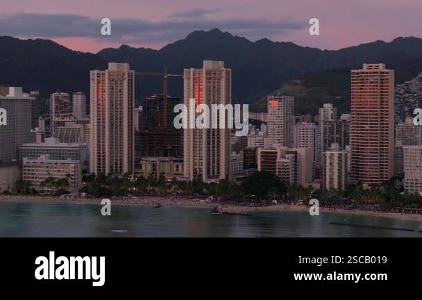 Aerial view of Honolulu, Hawaii, during sunset with Waikiki Beach, high ...