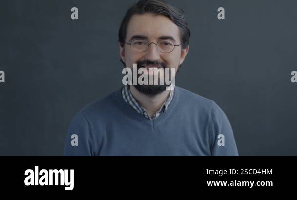 Slow motion portrait of happy Middle Eastern man laughing and showing ...