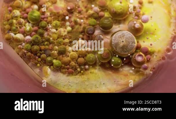 Fizzy fluid. Foam texture. Blur yellow pink golden color shimmering ...