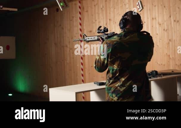 Portrait of happy military personnel using tactical operations ...