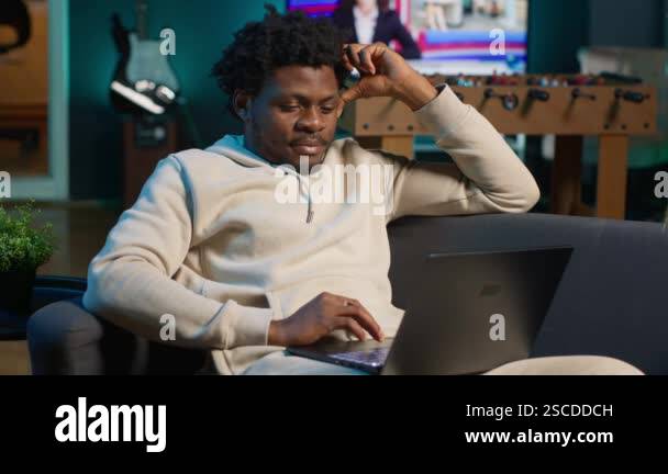 Home office user actively participating in a teleconference for remote ...