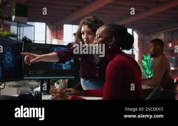 Teamworking engineers coding advanced AI algorithm and machine learning models enhancing ...