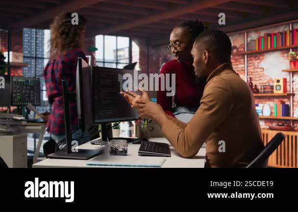 Team of startup admins doing brainstorming, working with machine learning tech advancing AI ...