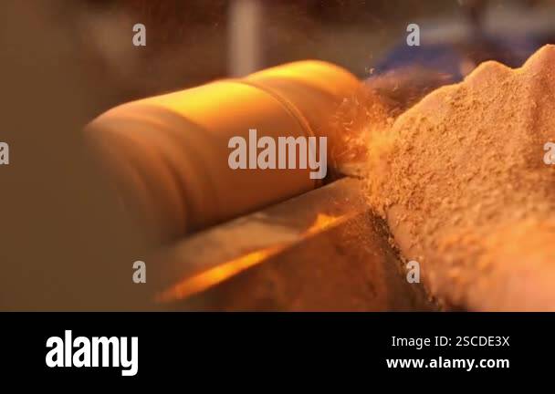 Slow motion. Close-up of carpenters hand, joiner works in workshop ...